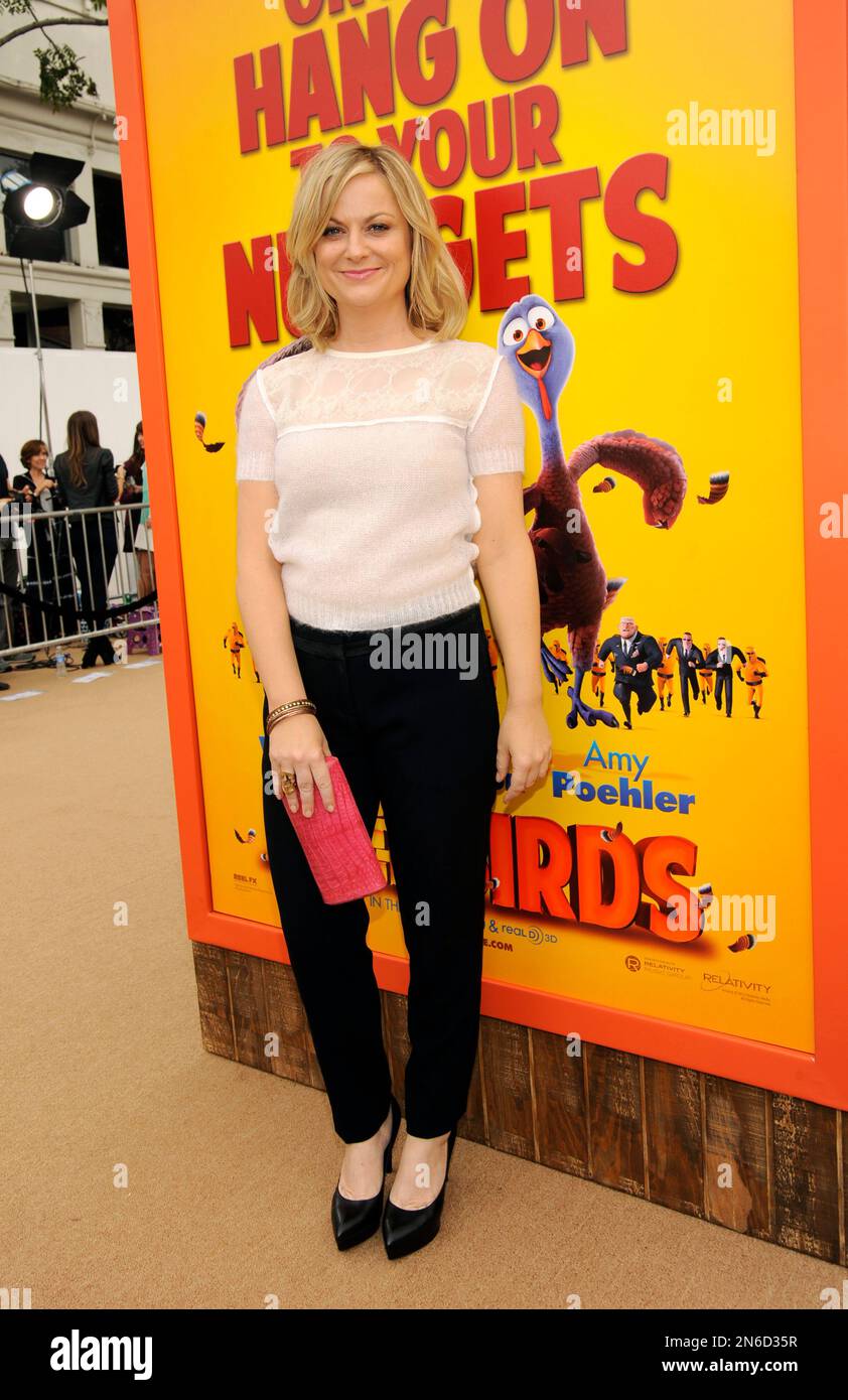 Cast member Amy Poehler poses at the world premiere of "Free Birds" at ...