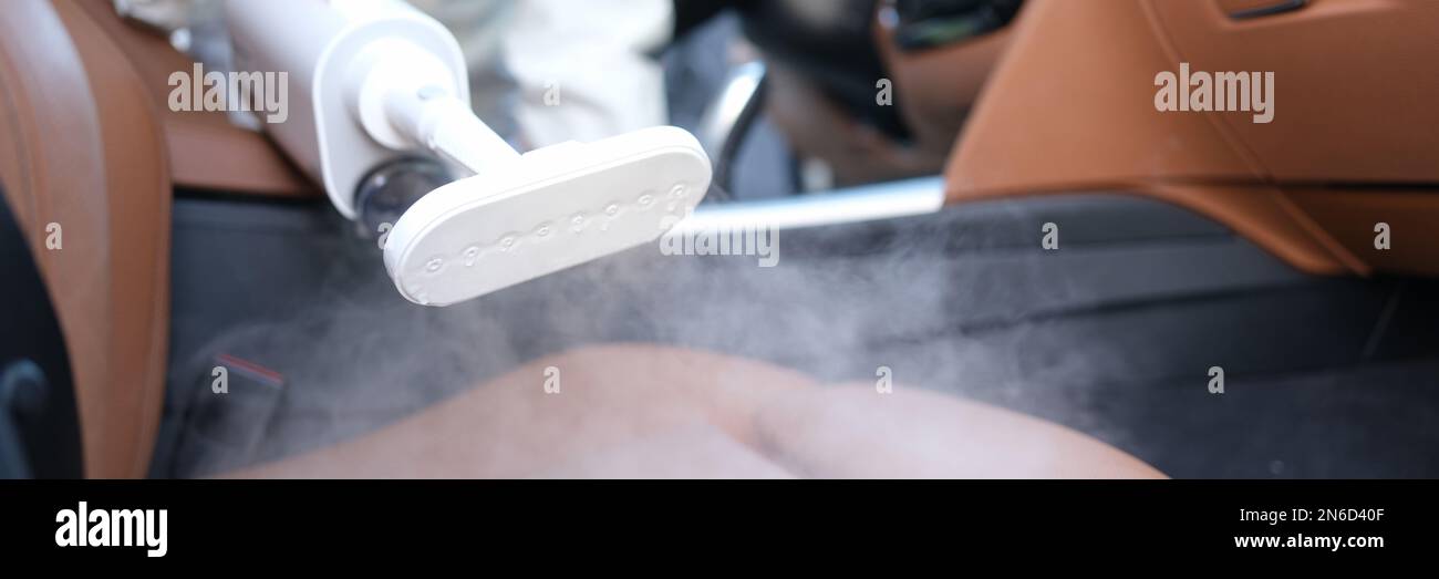 Steam cleaning and disinfection of car interiors and car seats with ...