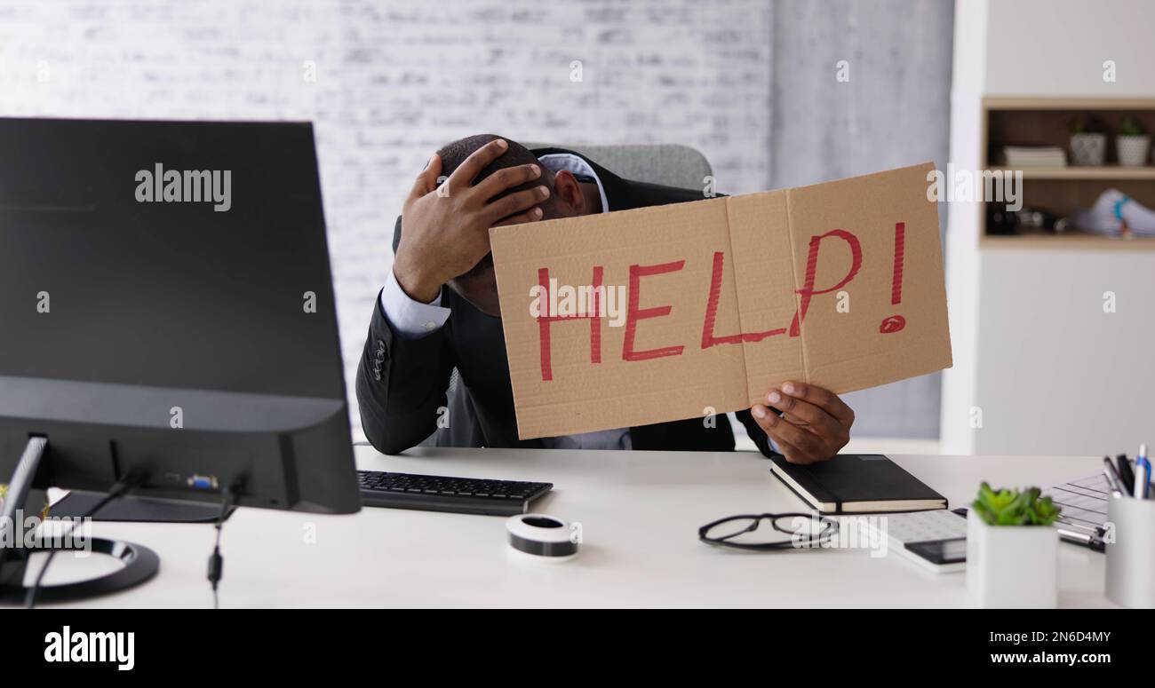 Stressed Sick African American Employee Man At Computer Stock Photo - Alamy