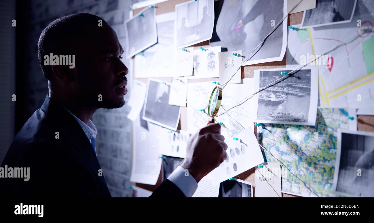 Police Inspection Looking For Clues On Investigation Board Stock Photo ...