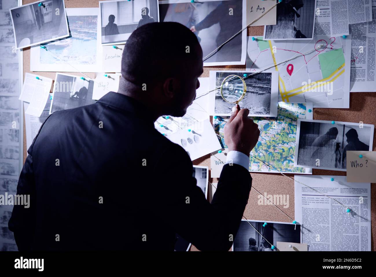 Police Inspection Looking For Clues On Investigation Board Stock Photo ...