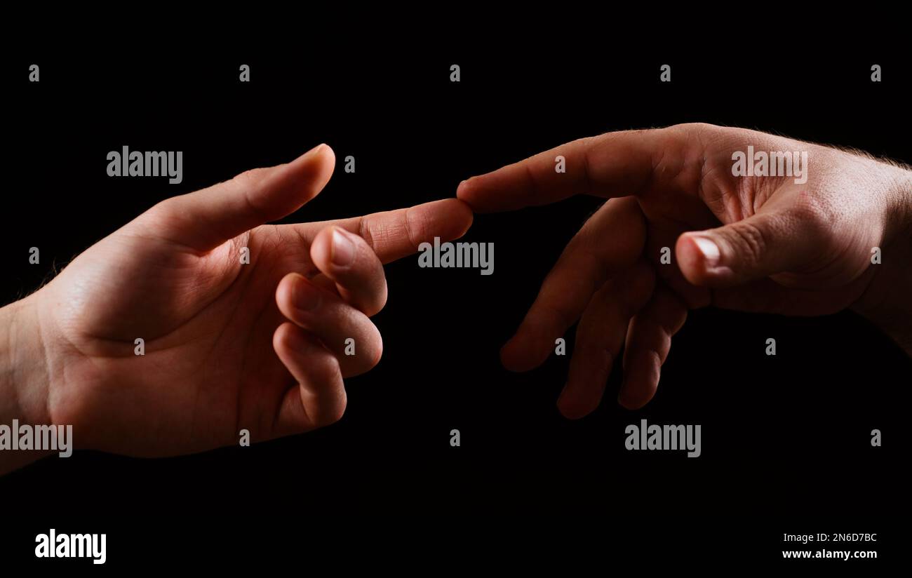 Sensual hand couple. Giving a helping hand. Solidarity, compassion, and ...