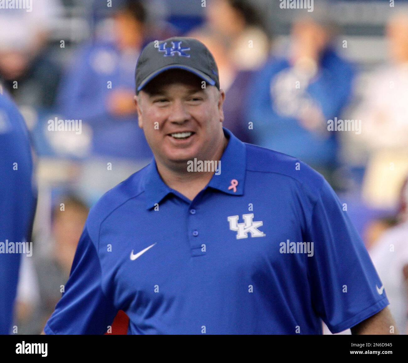 Kentucky coach Mark Stoops was all smiles as he watched his team warm ...