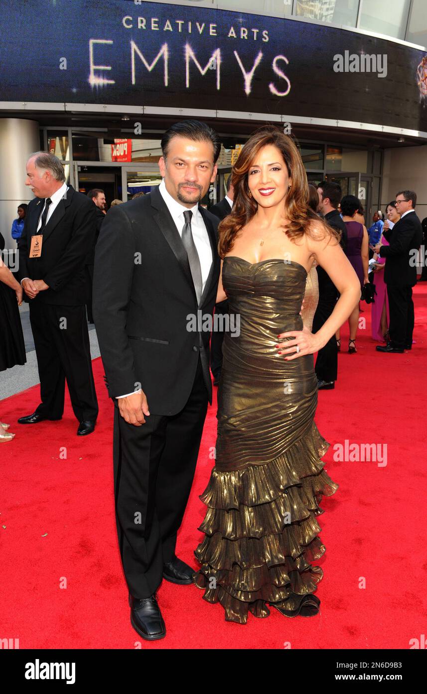 LOS ANGELES, CA - SEPTEMBER 15: Maria Canals-Berrera (R) and husband ...