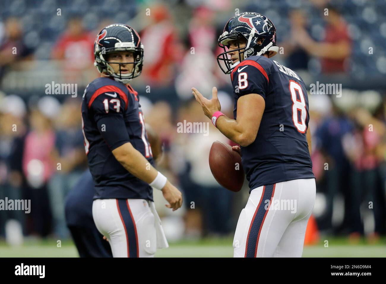 Houston Texans quarterback T.J. Yates (13), left, and Matt Schaub (8 ...