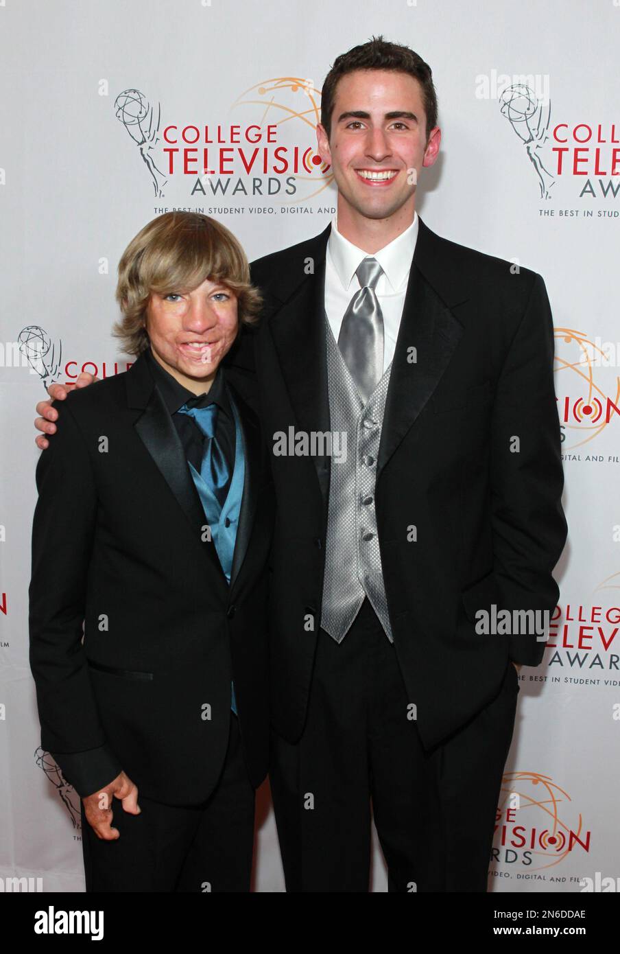 HOLLYWOOD, CA - MARCH 31: Marius Woodward (L) and Mark Williams pose in ...