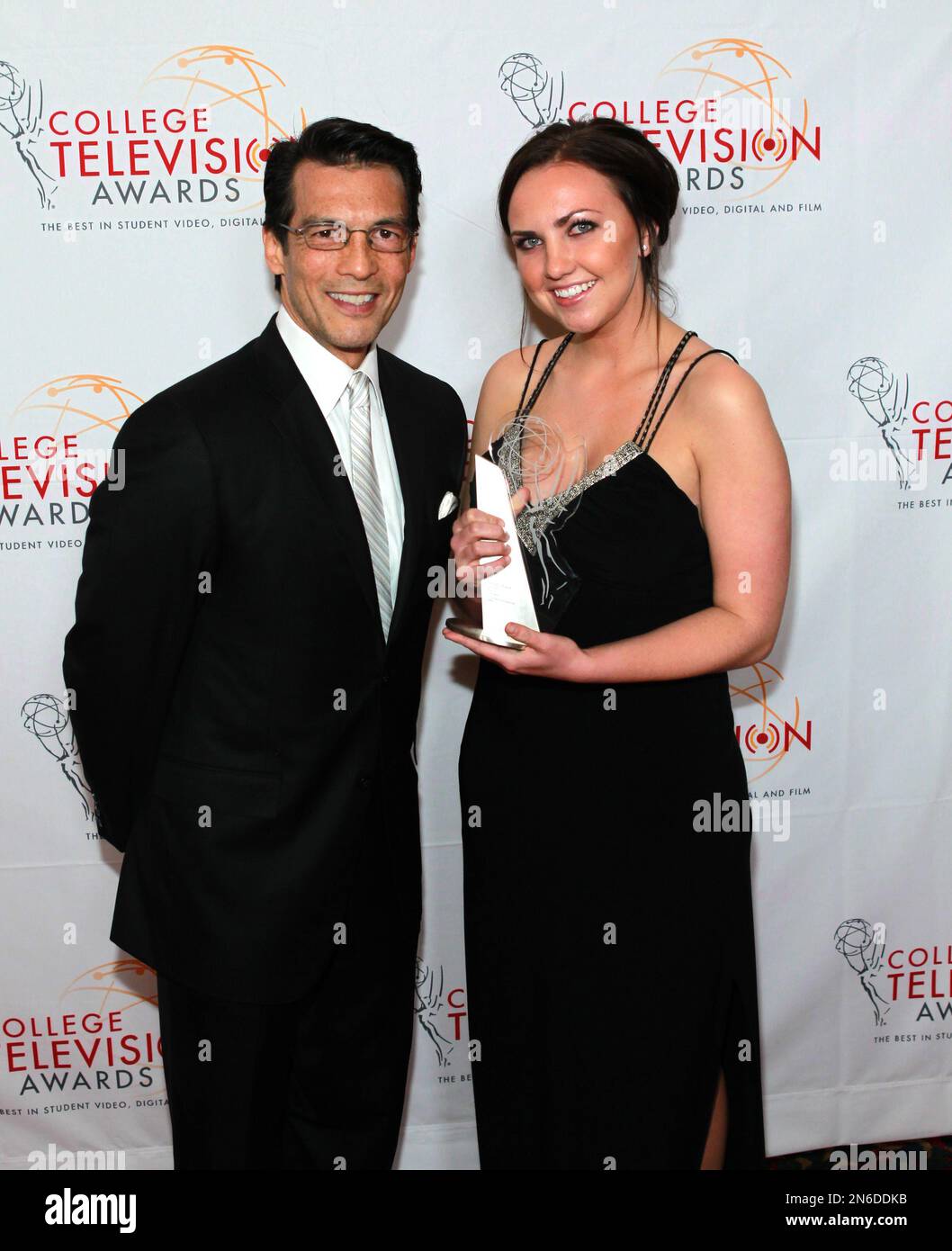 HOLLYWOOD, CA - MARCH 31: David Ono (L), Jinnefer Austin pose in the ...
