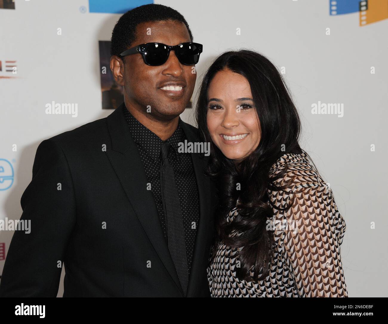 Kenneth Edmonds, left, and Nicole Pantenburg arrive at the Hugh Jackman ...