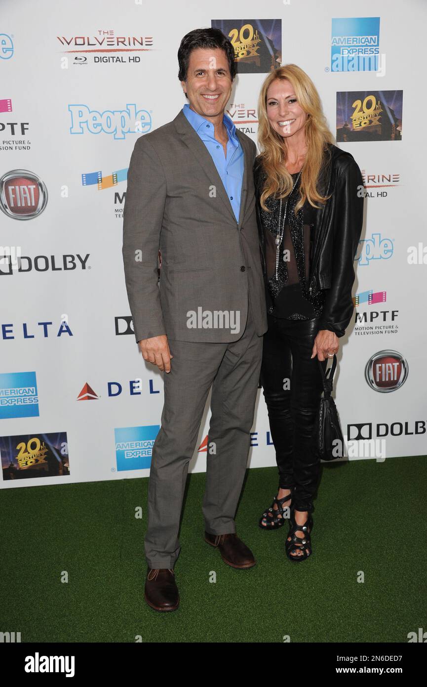 Steven Levitan, left, and Krista Levitan arrive at the Hugh Jackman One ...