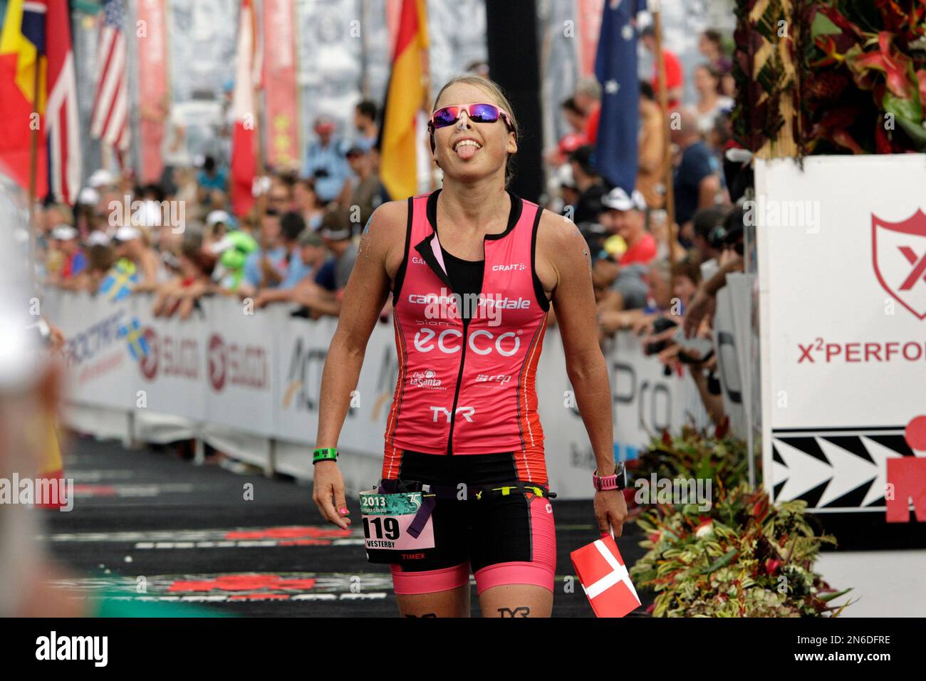 Michelle Versterby, of Denmark, crosses the finish line to place eighth ...