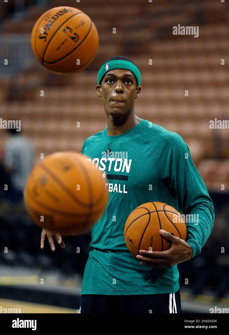 Boston Celtics' Rajon Rondo fields balls before an NBA preseason ...