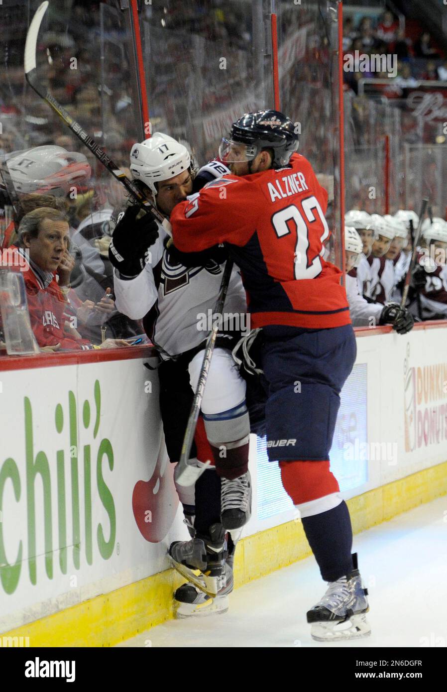 Washington Capitals defenseman Karl Alzner (27) checks Colorado ...