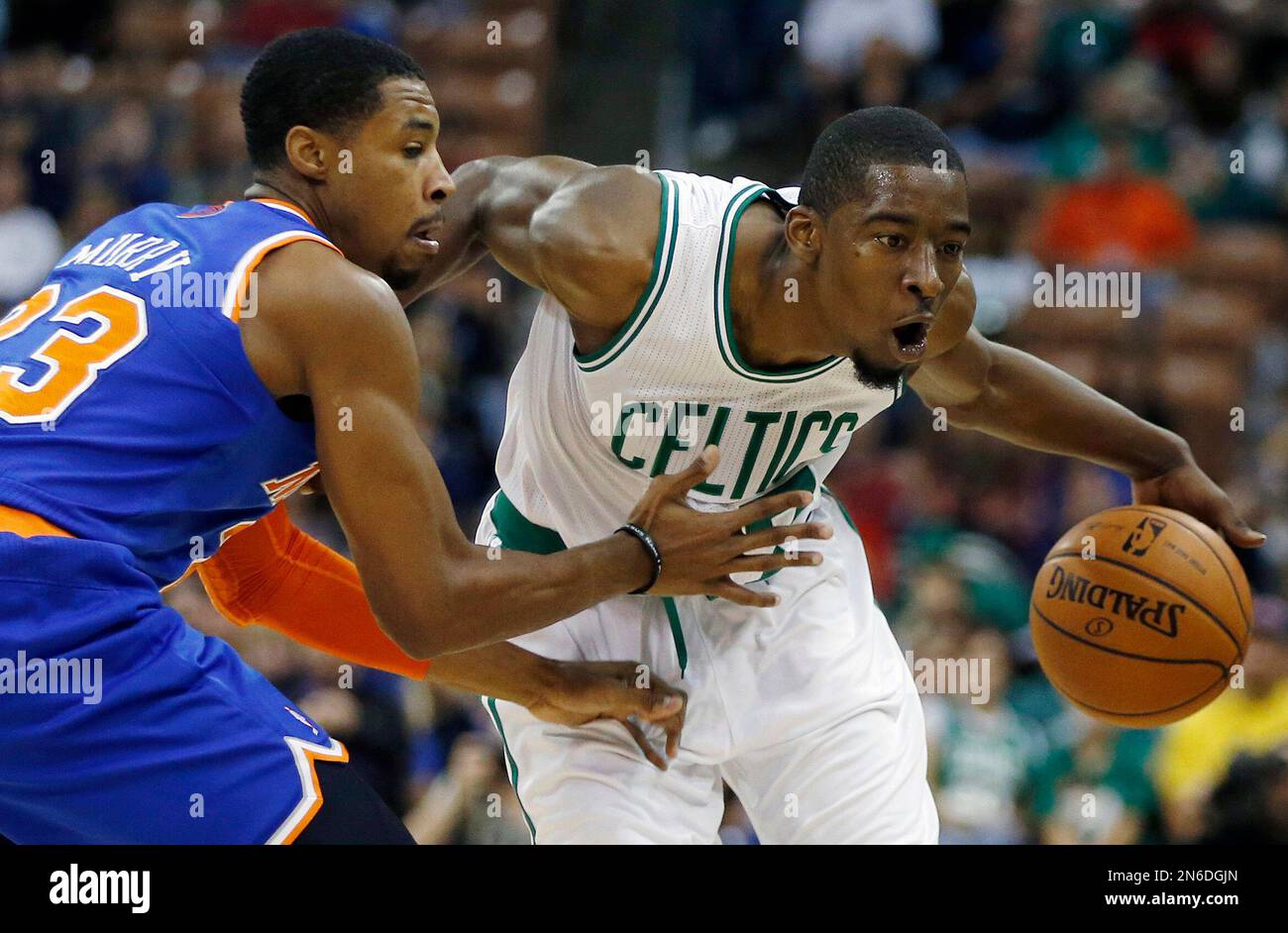 Boston Celtics' Jordan Crawford (27) drives past New York Knicks' Toure ...