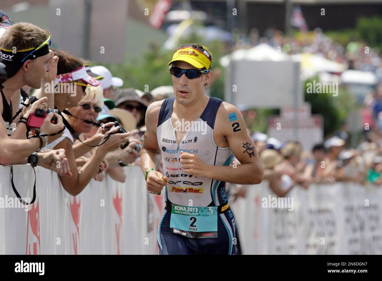 Competitor Sebastian Kienle, of Germany, begins the 26.2 mile marathon ...