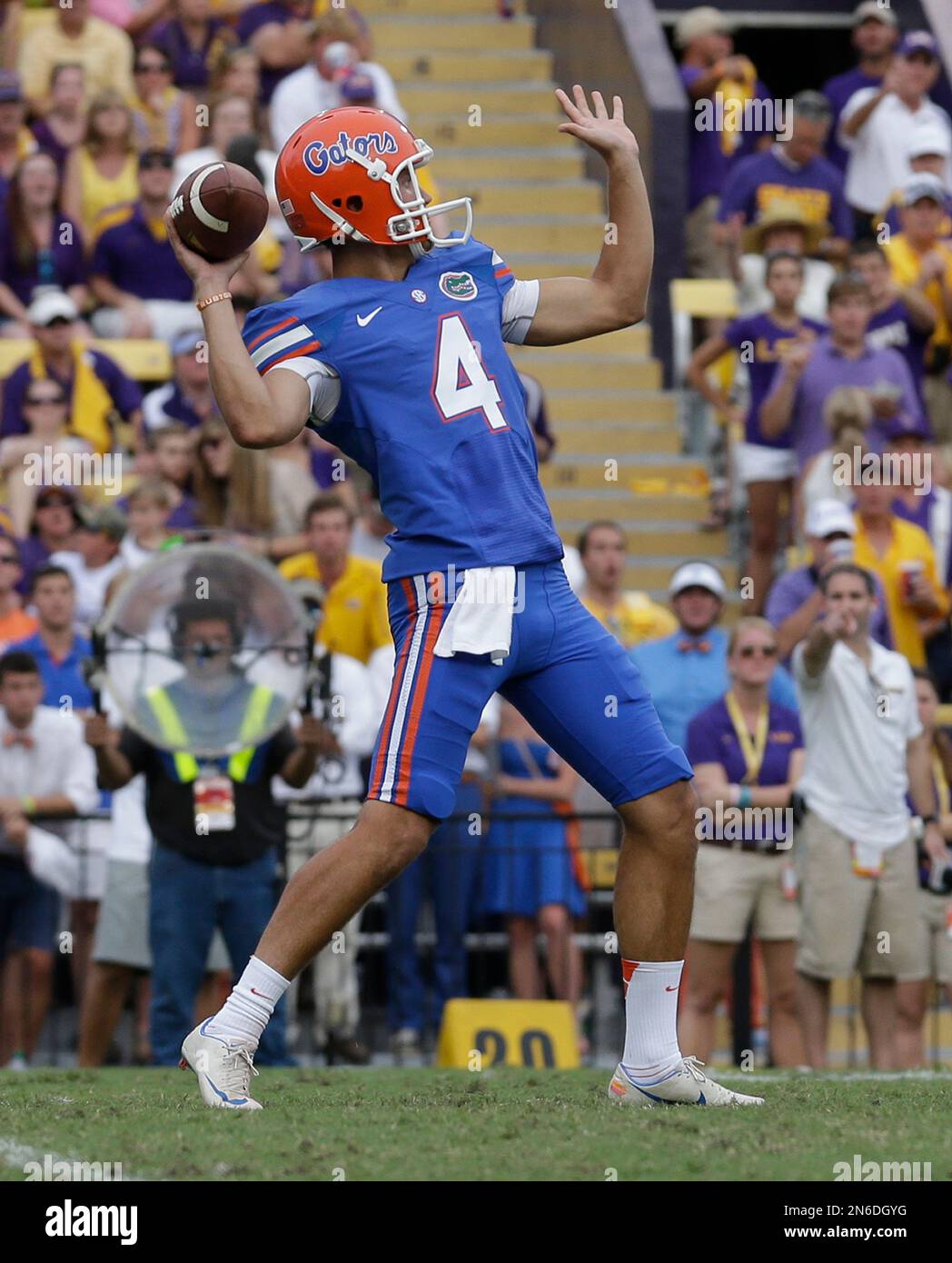Florida punter Kyle Christy (4) passes on a fake punt in the second ...