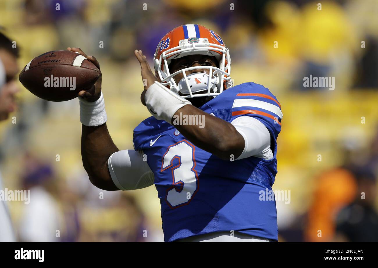 Florida quarterback Tyler Murphy (3) warms up before an NCAA college ...