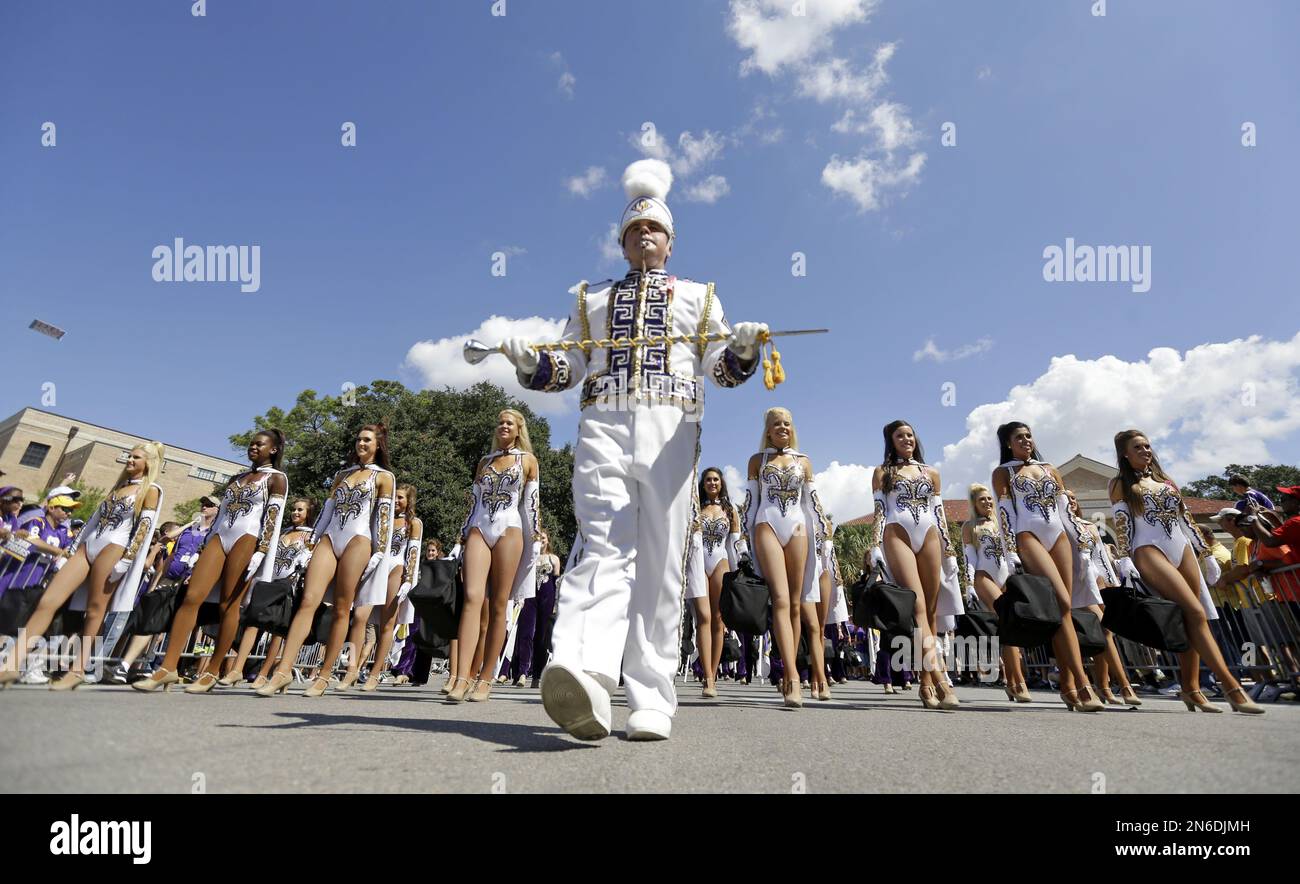 The LSU marching band drum major and the LSU Golden Girls dance team ...