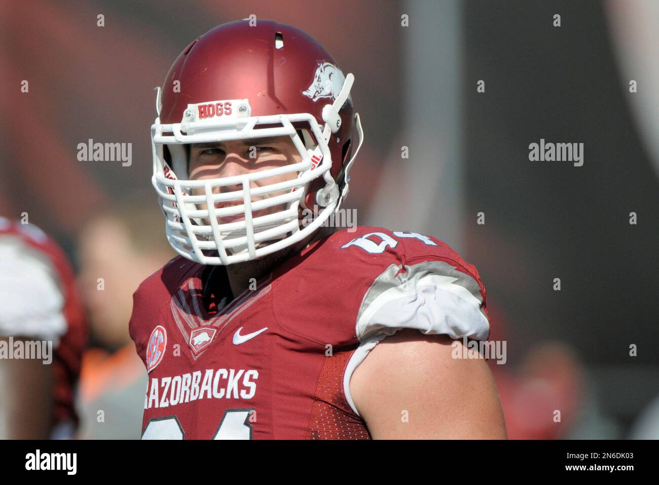 Arkansas center Travis Swanson walks onto the field before an NCAA ...
