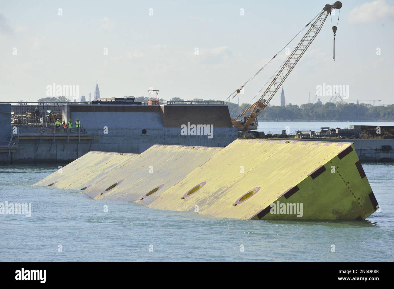 Movable underwater panels emerge from the lagoon Saturday, Oct. 12 ...