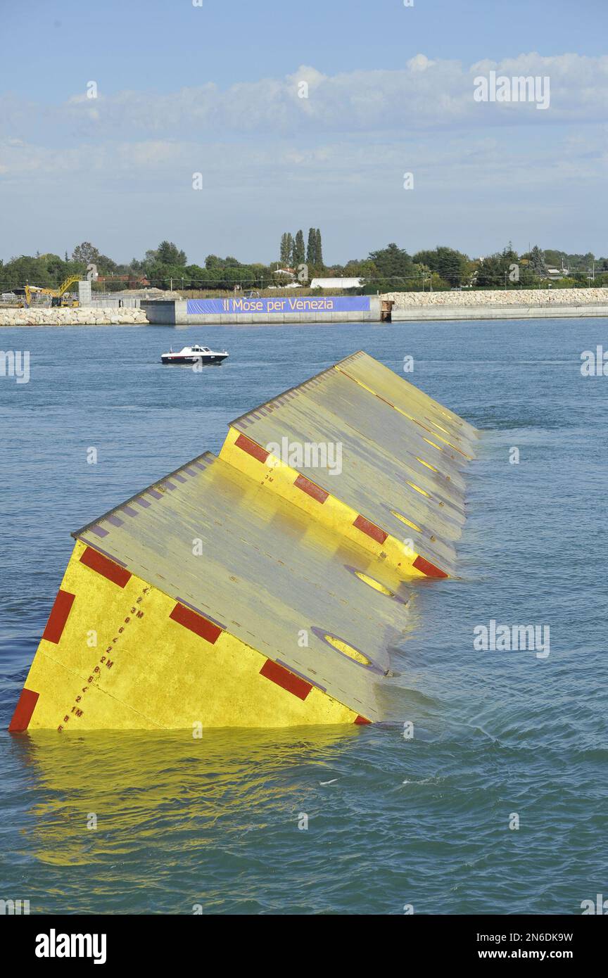 Movable underwater panels emerge from the lagoon Saturday, Oct. 12 ...