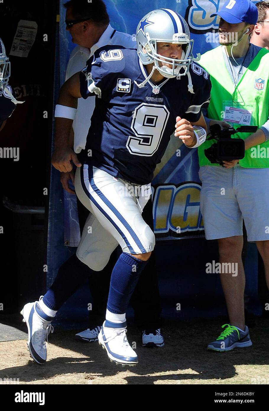 Dallas Cowboys quarterback #9 Tony Romo takes the field before a game ...