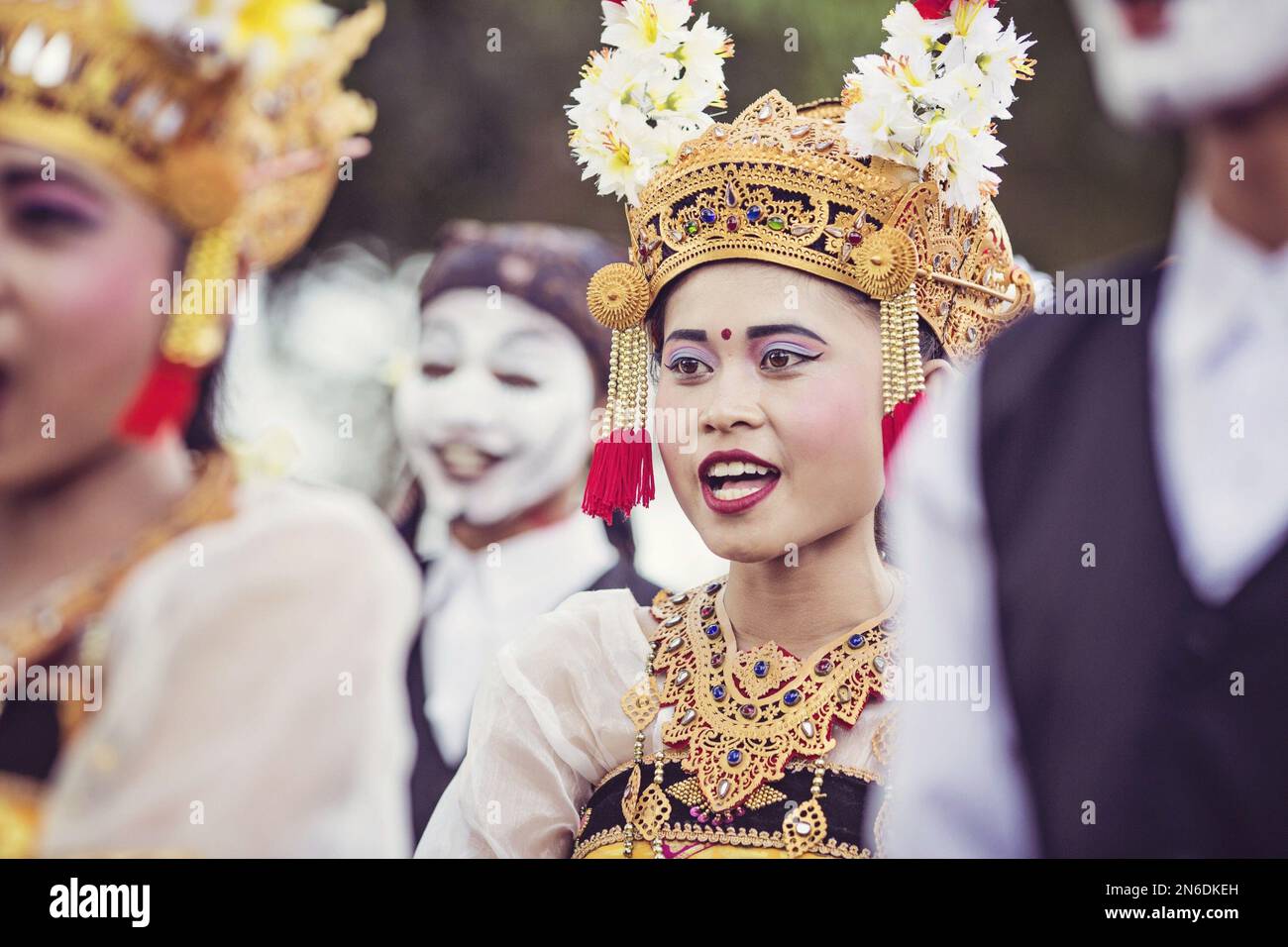 A Beautiful young Indonesian lady wearing traditional Balinese dress ...
