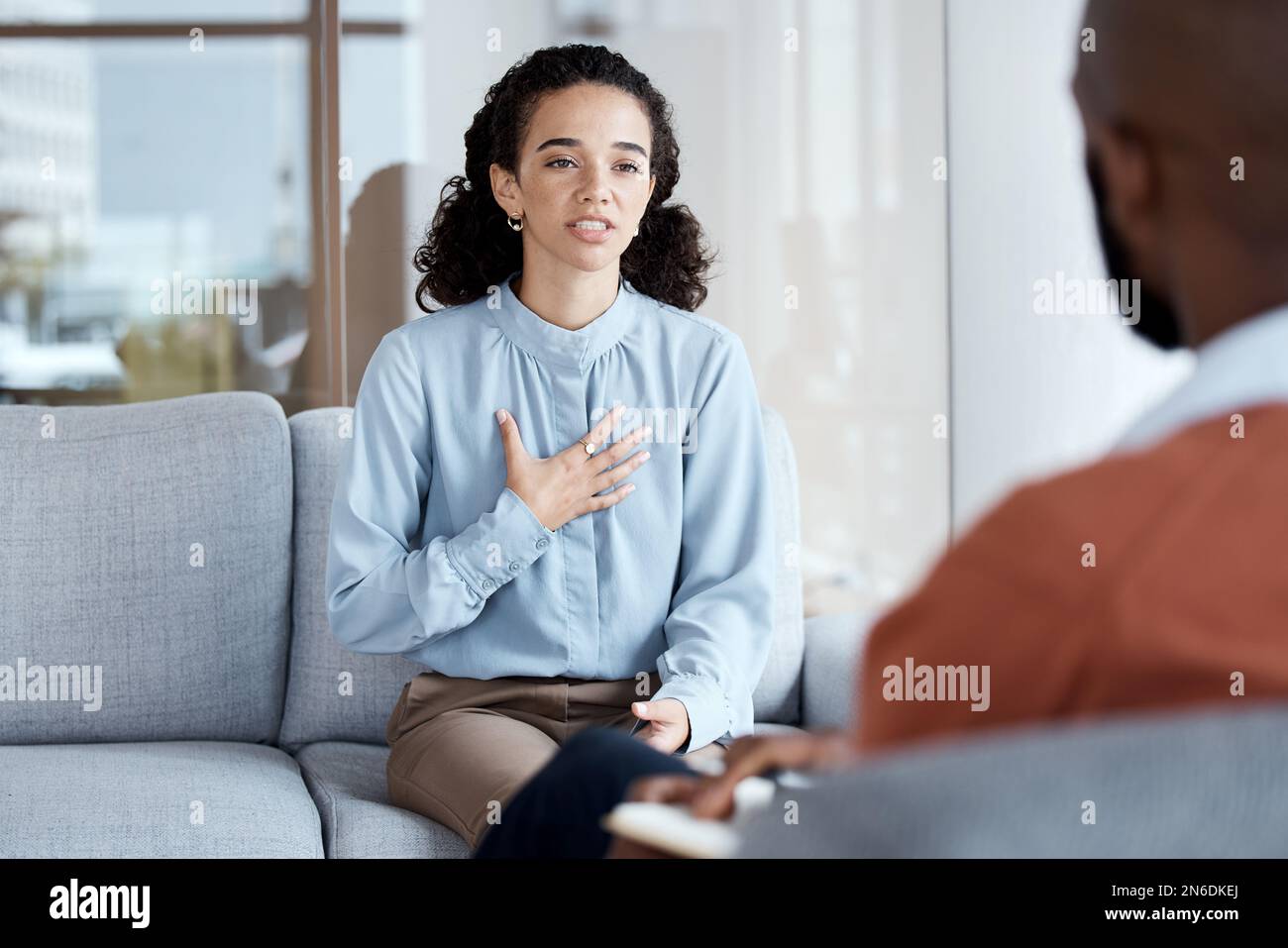 Therapy, counselling and mental health conversation with woman patient ...