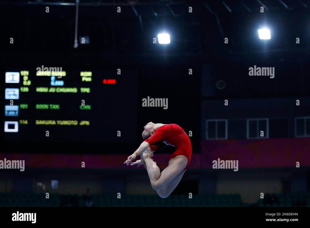 China's Tan Sixin performs on the balance beam during artistic ...