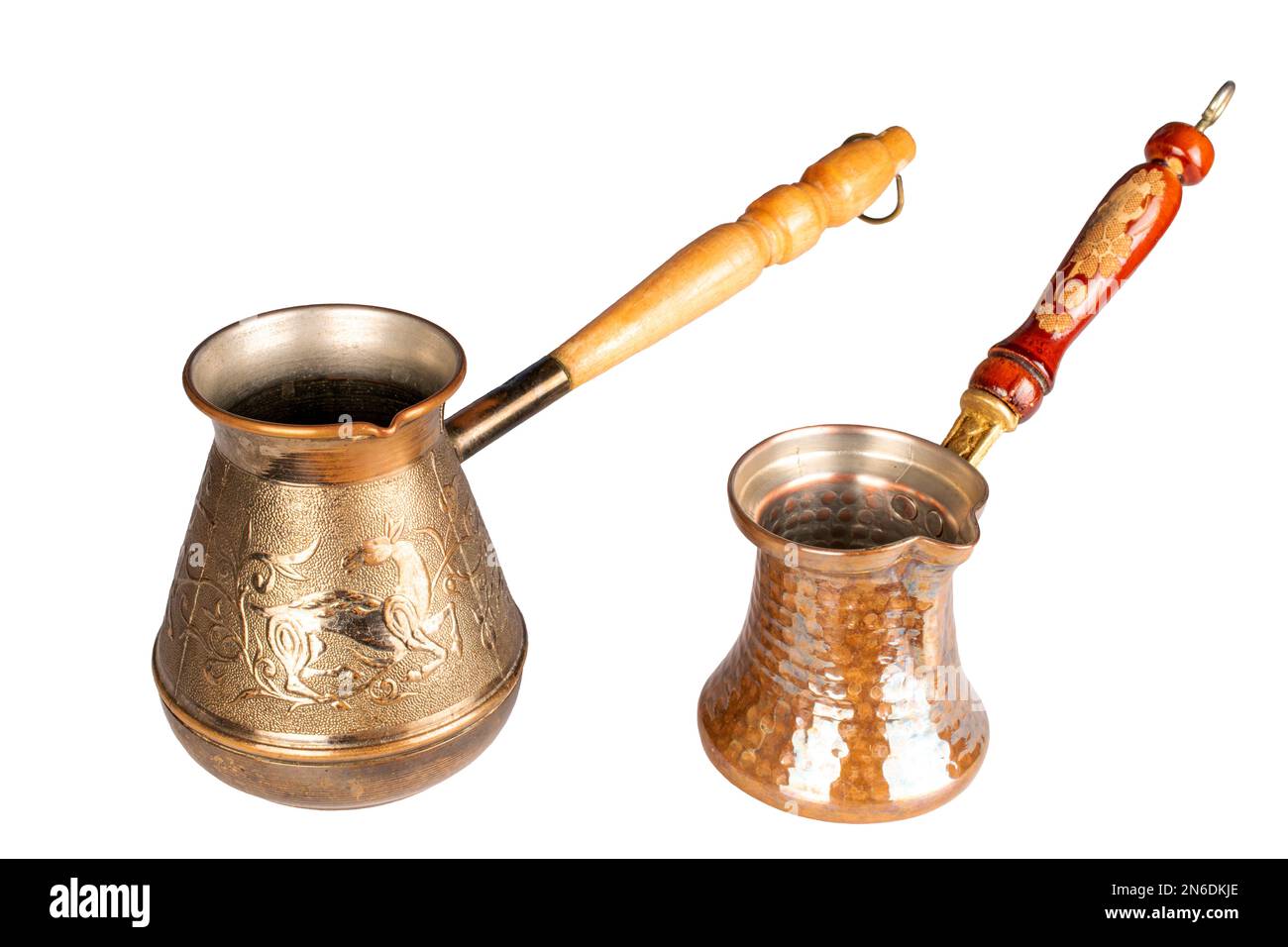 Two copper cezves, macro, isolated on white background Stock Photo - Alamy