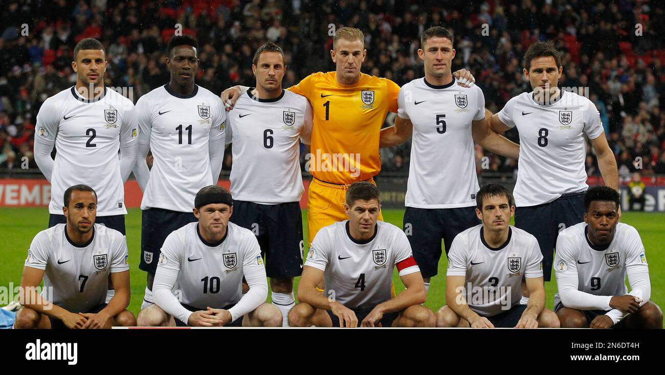 The England soccer team pose for a photograph as they line up before ...