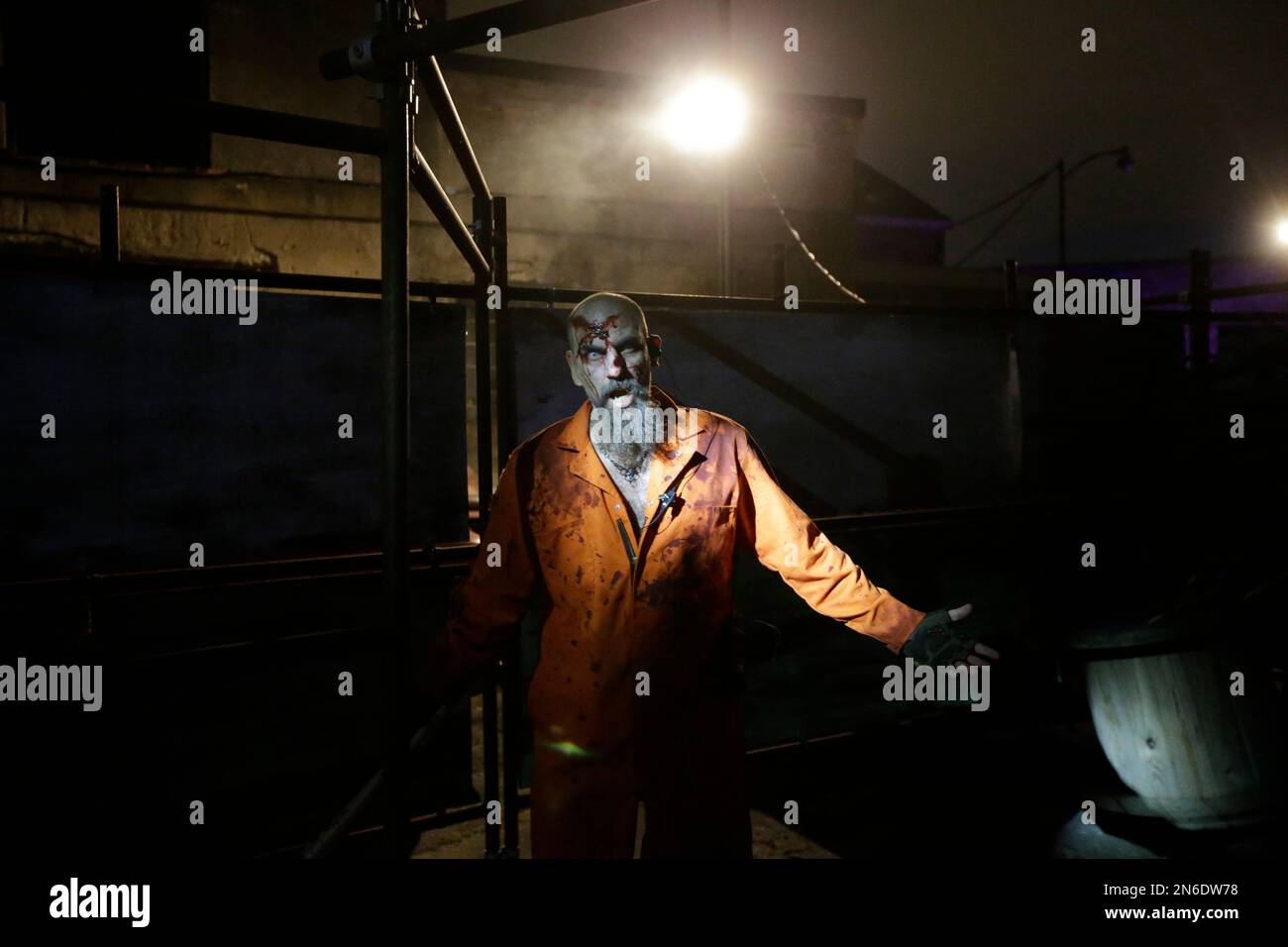 In this Friday, Sept. 27, 2013 photo, a zombie inmate poses for a ...