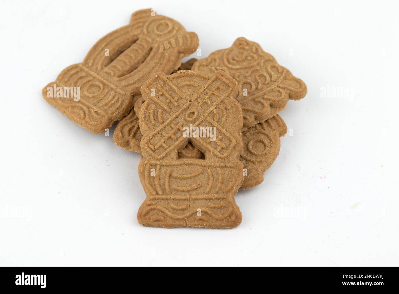 A closeup shot of cookies of different shapes isolated on the empty ...
