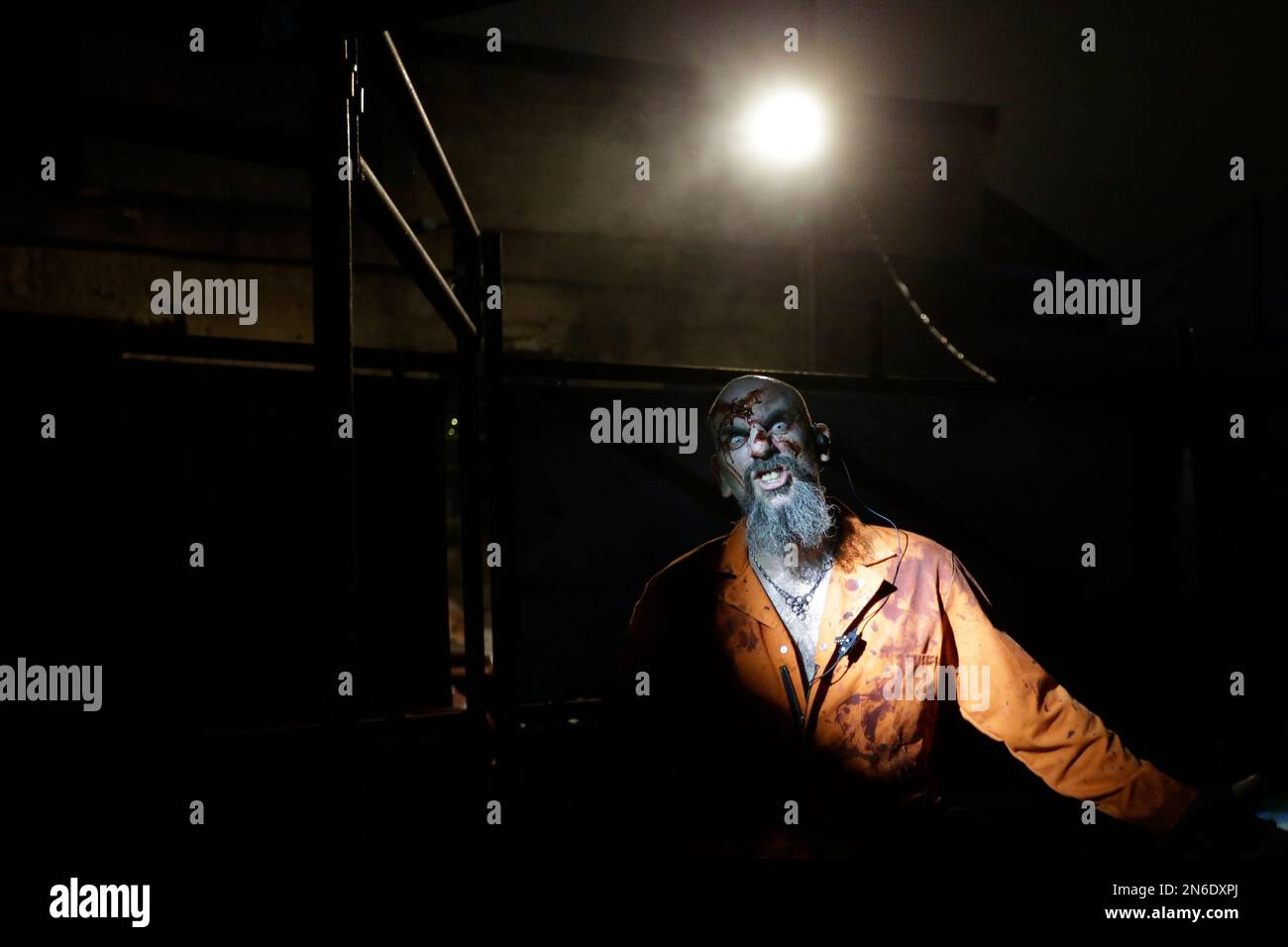 In this Friday, Sept. 27, 2013 photo, a zombie inmate poses for a ...