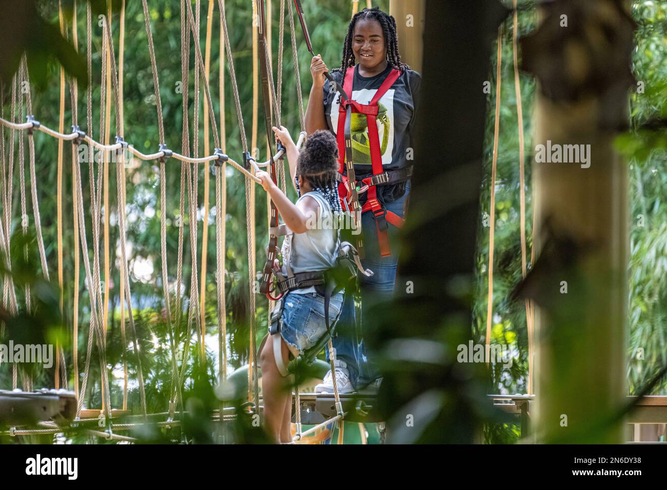 Young woman and a child enjoying the fun and adventure of Zoo Atlanta's ...