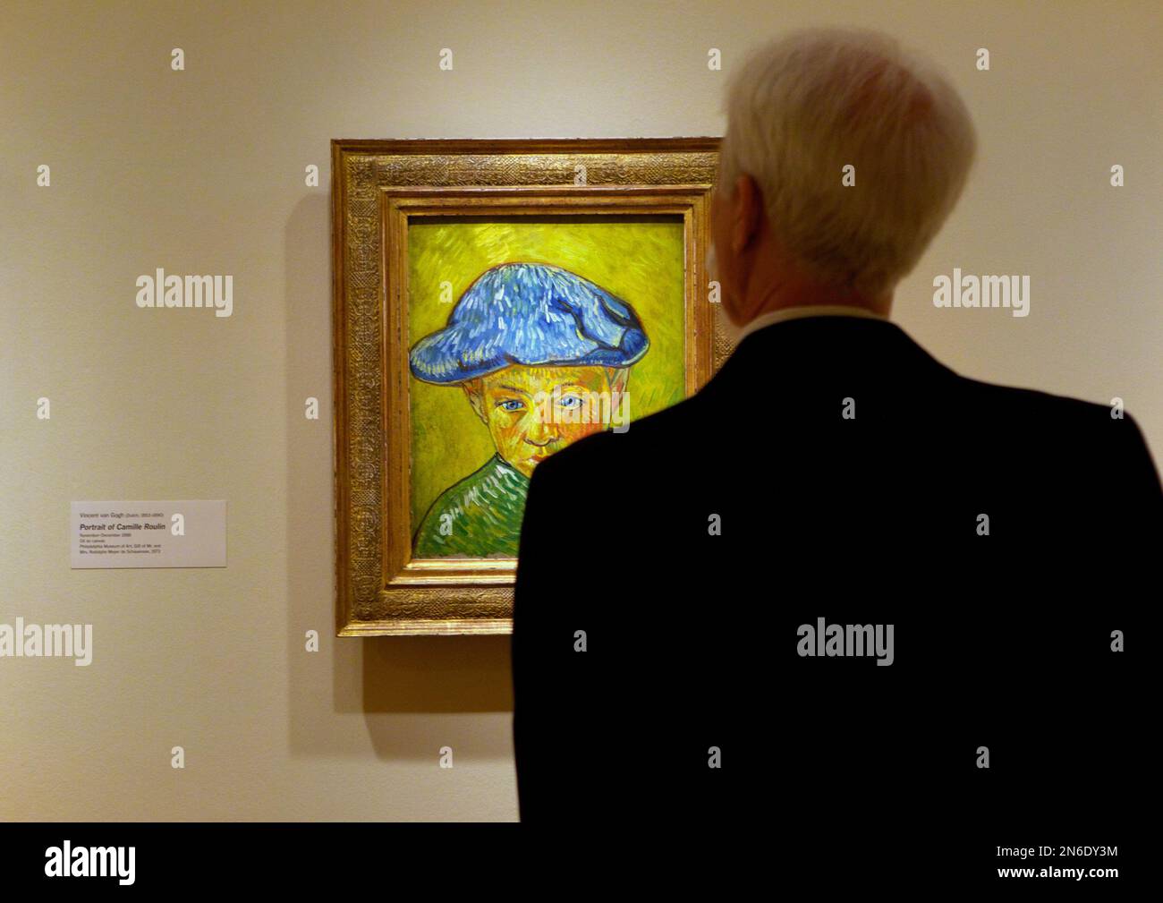 A visitor studies Vincent van Gogh's "Portrait of Camille Roulin," on ...