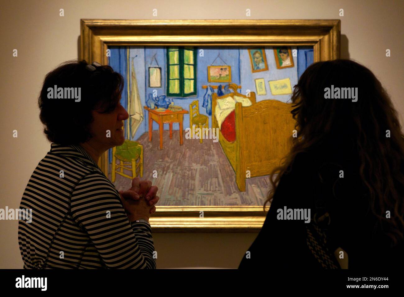 In this Oct. 8, 2013 photo, women discuss Vincent van Gogh's "The ...