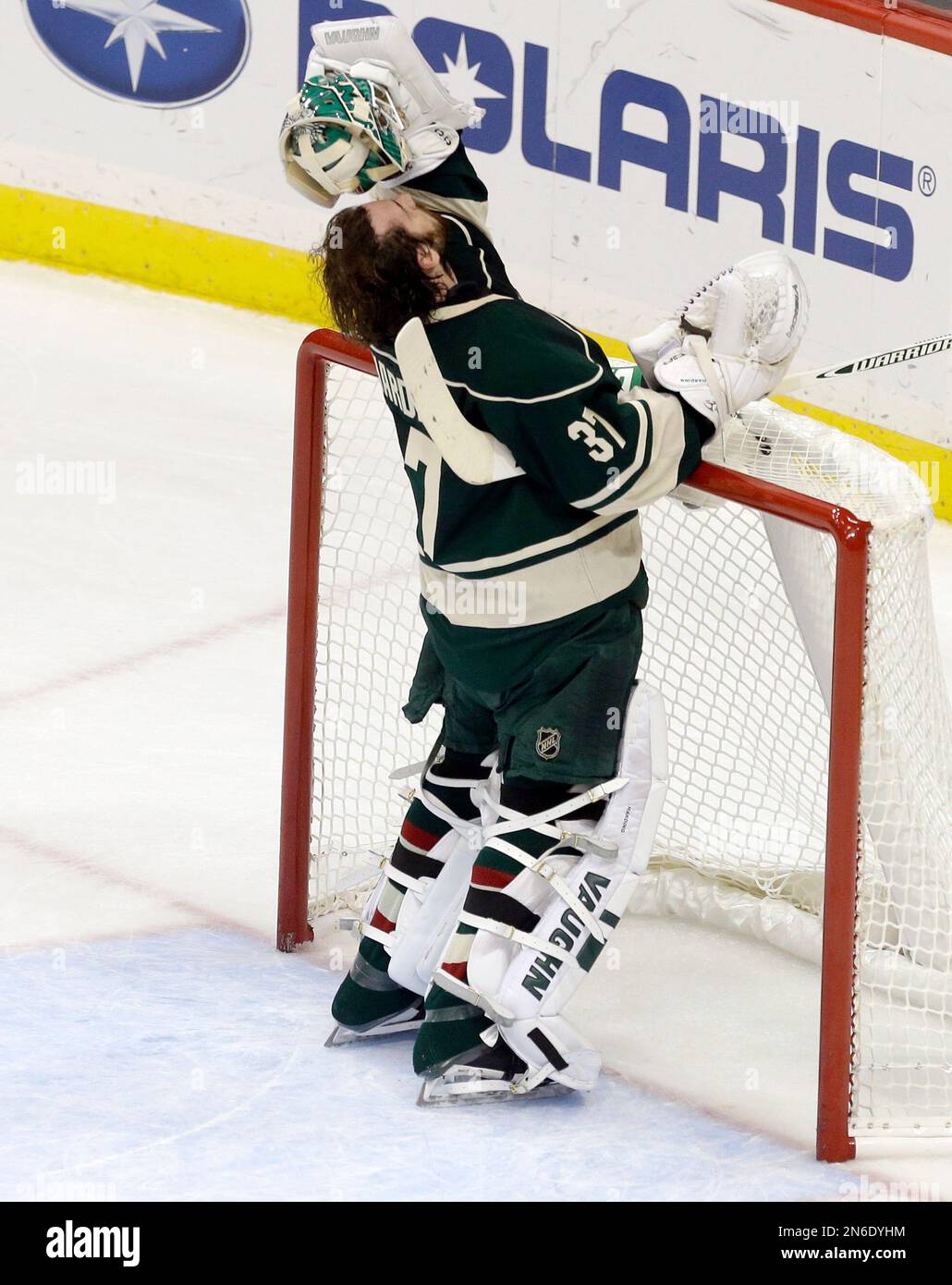 Minnesota Wild goalie Josh Harding takes a break in the first period of ...