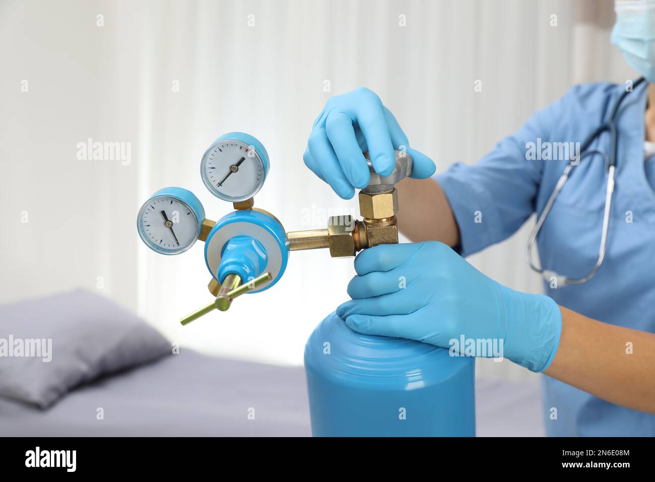 Medical worker checking oxygen tank in hospital room, closeup Stock ...