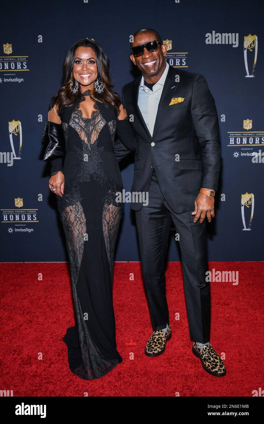 Tracey Edmonds and Deion Sanders walking on the red carpet at NFL ...