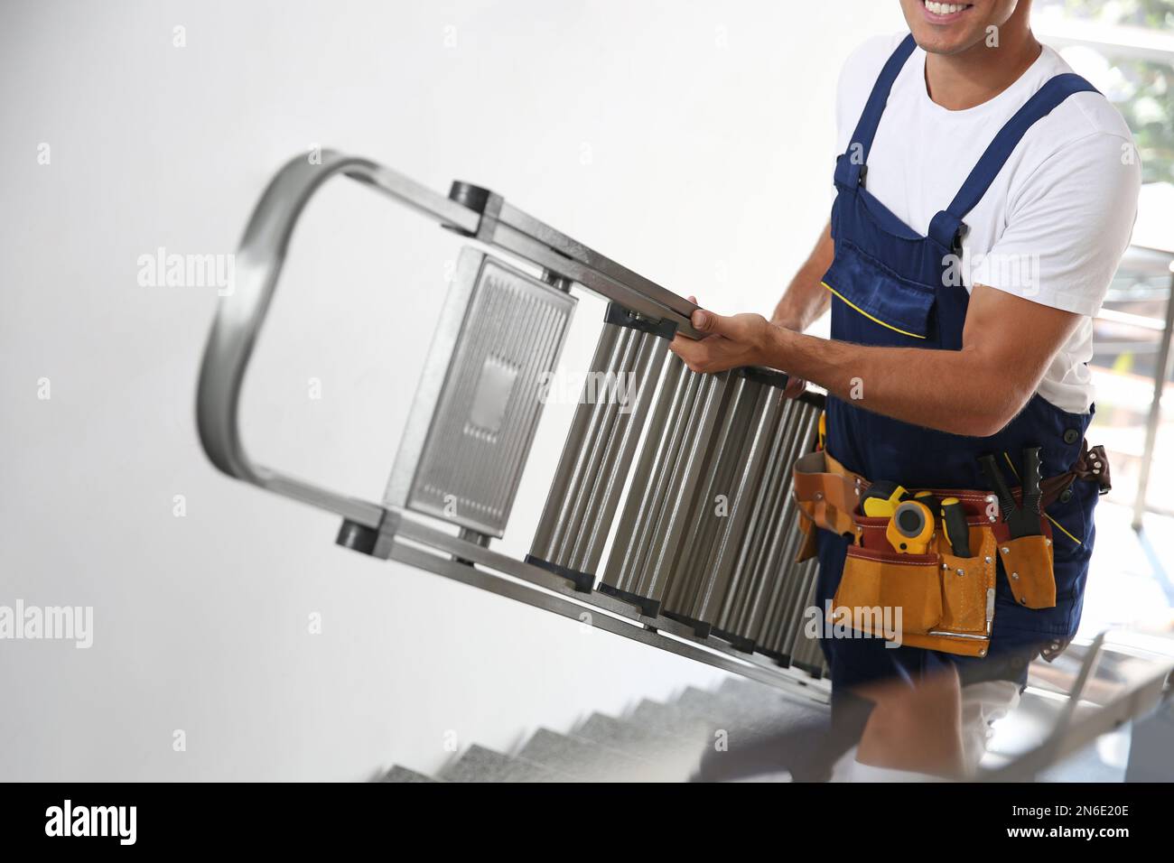 Professional builder carrying metal hi-res stock photography and images ...