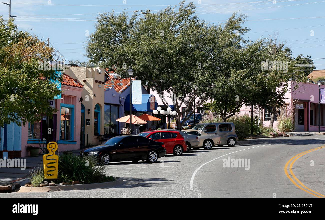 This Oct. 9, 2013 photo shows shops in the colorful Paseo Arts District ...