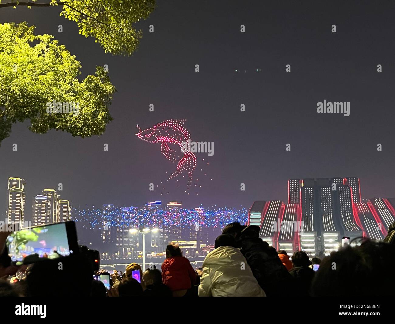 CHONGQING, CHINA - JANUARY 21, 2023 - (FILE) Tourists watch a drone ...