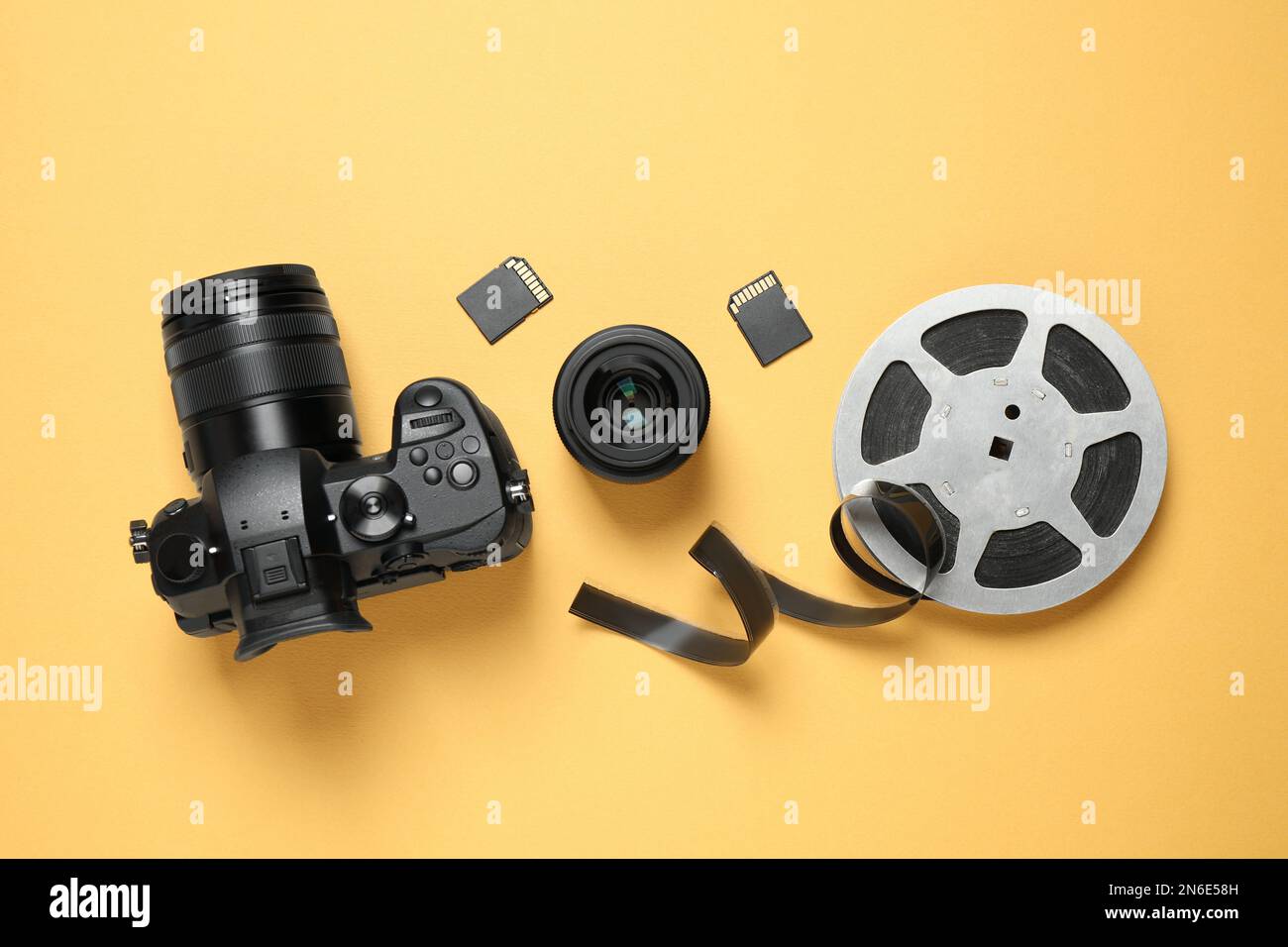 Flat lay composition with camera and video production equipment on ...