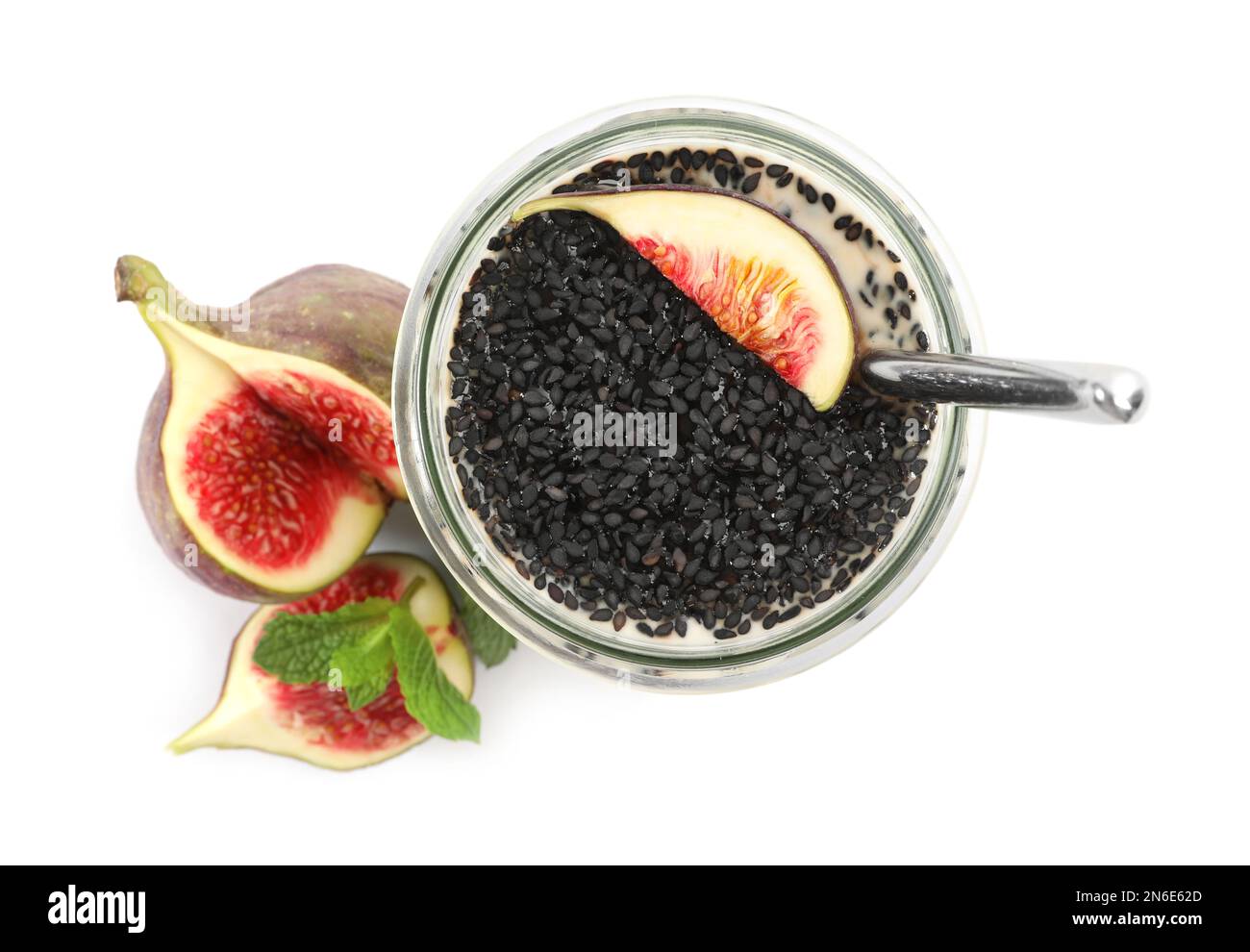 Delicious fig smoothie and ingredients on white background, top view ...