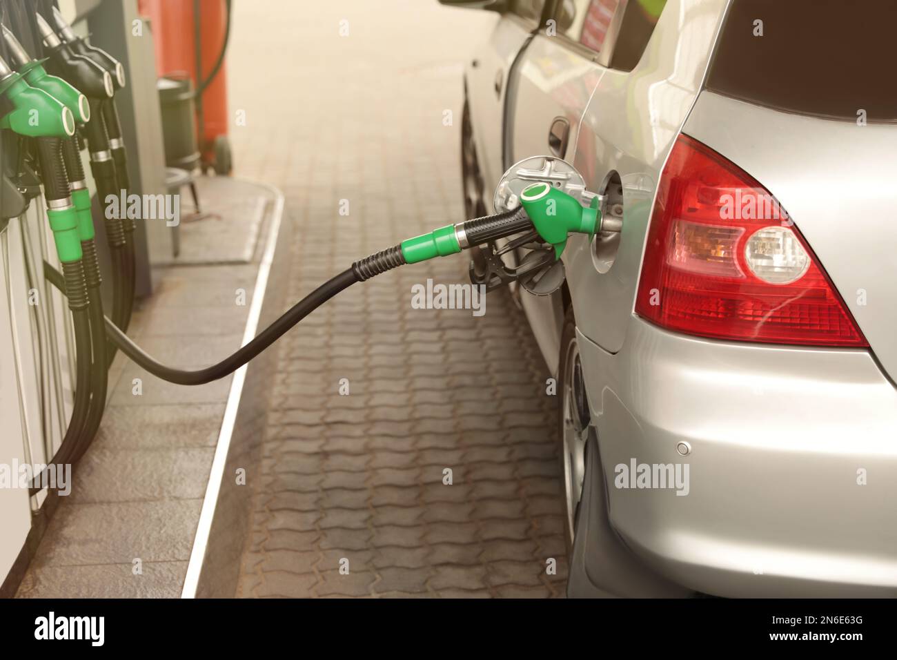 Refueling modern car at gas filling station, closeup Stock Photo - Alamy