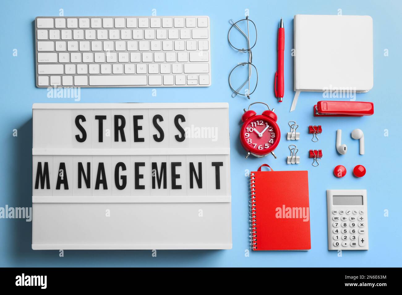 Flat lay composition of lightbox with phrase Stress Management on light ...