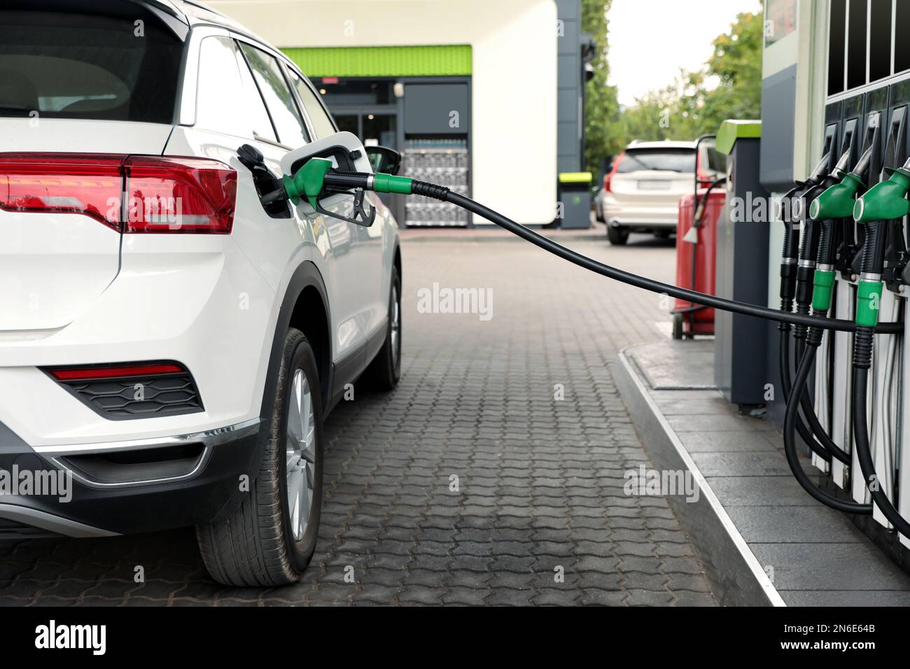 Refueling modern car at gas filling station, closeup Stock Photo - Alamy