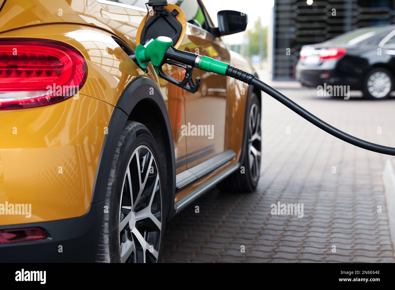 Refueling modern car at gas filling station, closeup Stock Photo - Alamy