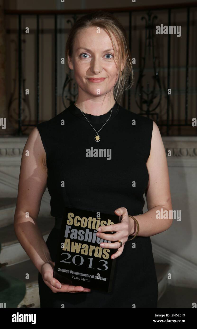 Penny Martin holds the Communicator of the Year award at the 8th Annual ...