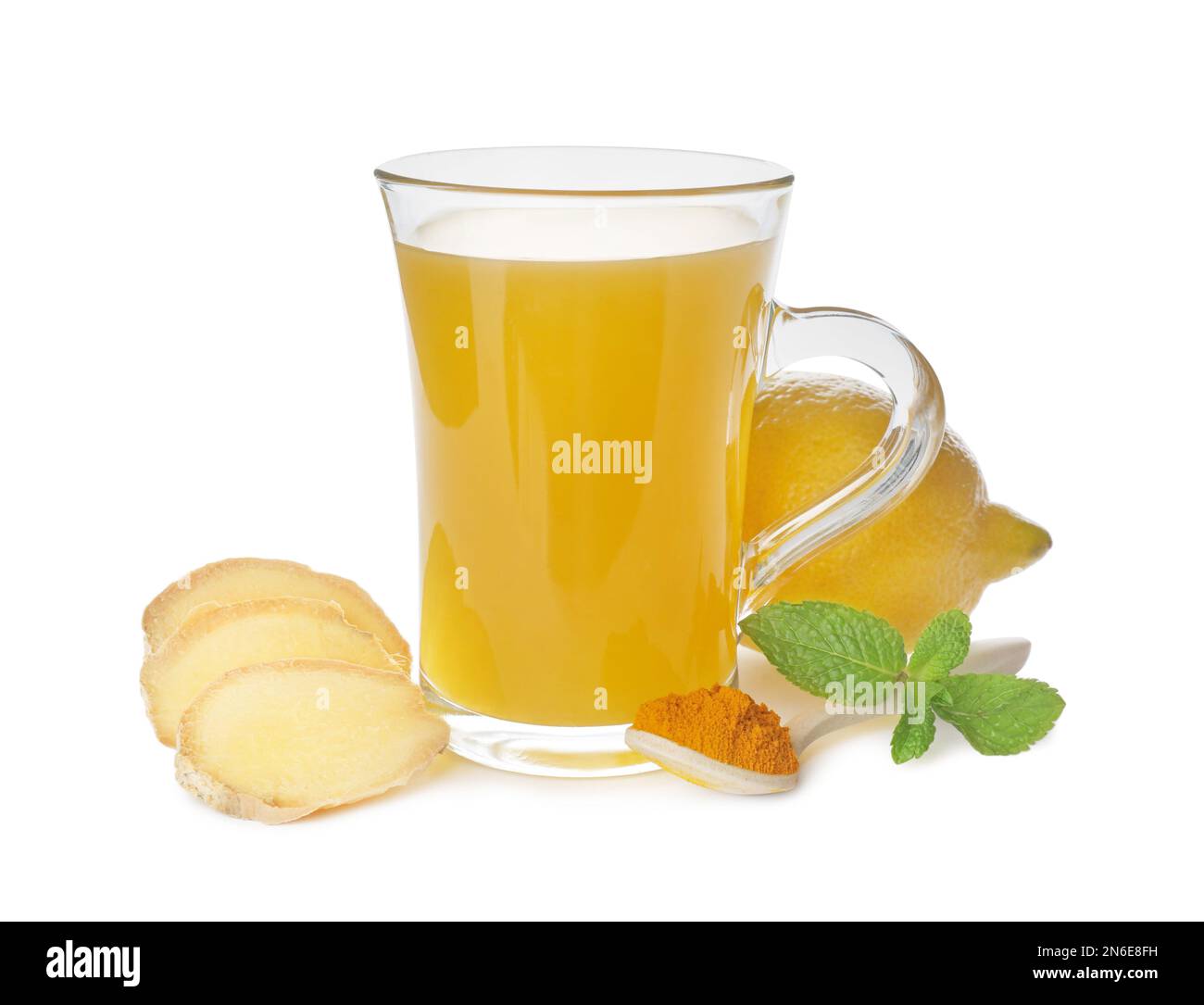 Immunity boosting drink with ginger, lemon, mint and turmeric on white ...